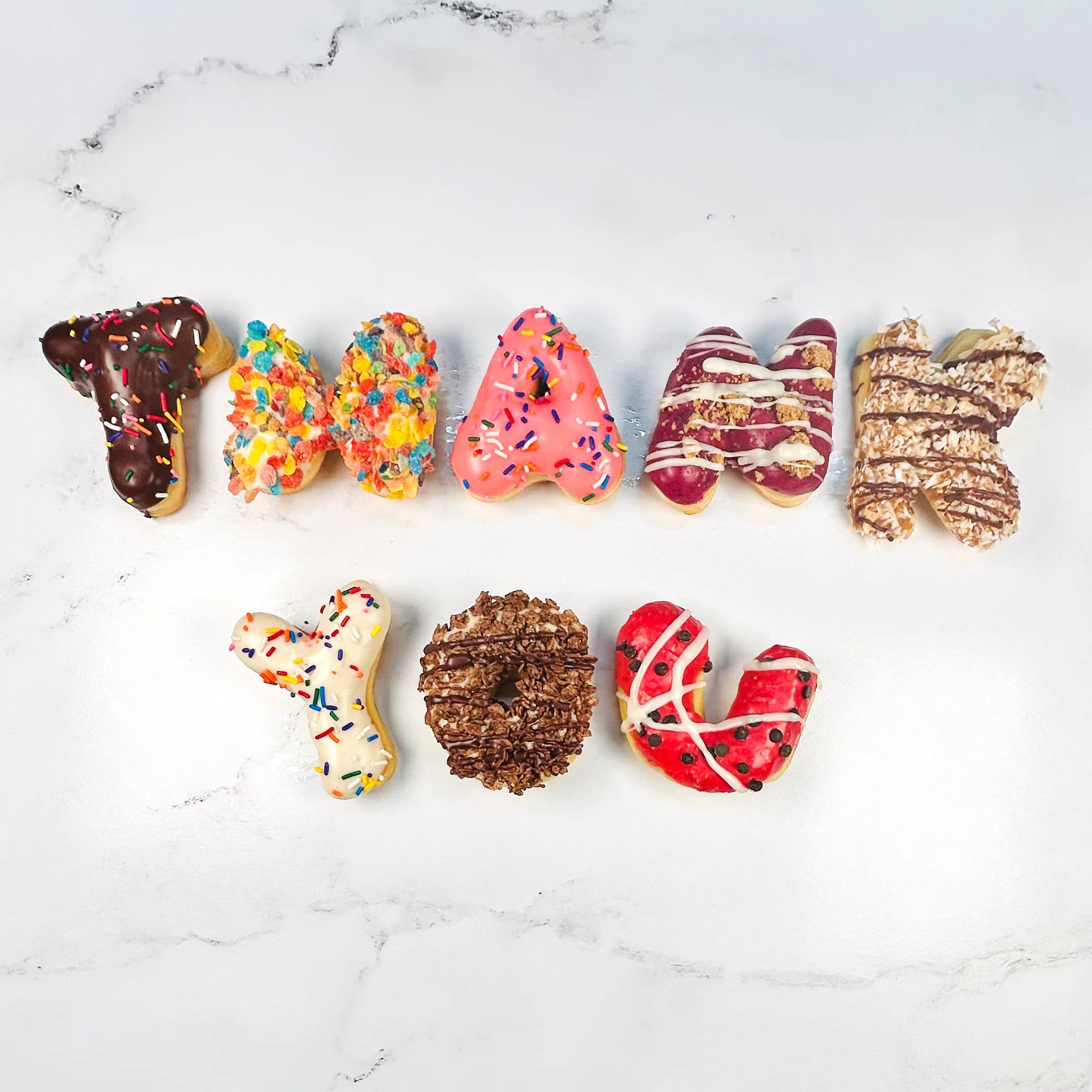 "Thank You" Donuts by Angel Food Bakery | Goldbelly