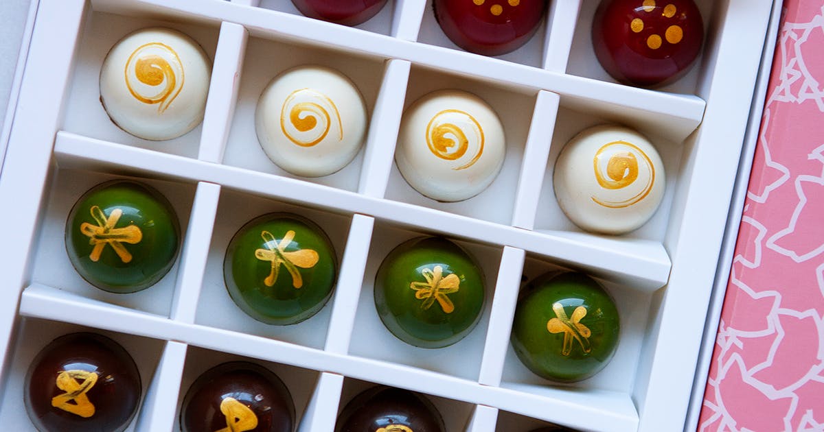 Christmas Bonbon Gift Box - 16 Pieces by Les Madeleines | Goldbelly