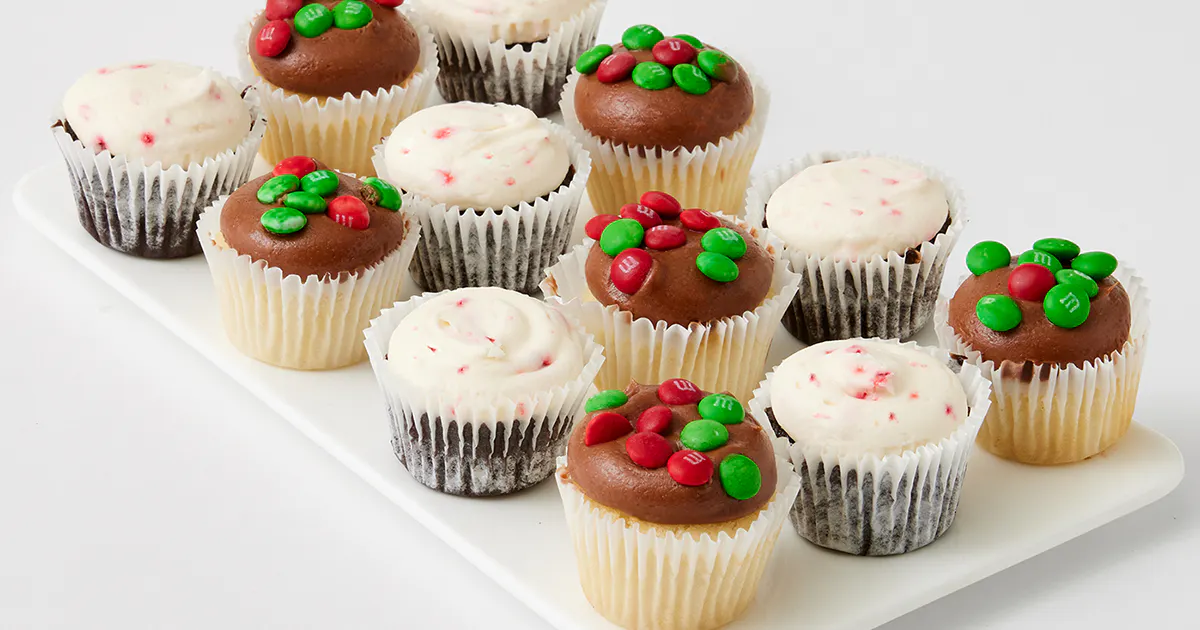 Holiday Candy Store Mini Cupcakes - 24 Pack by Magnolia Bakery | Goldbelly