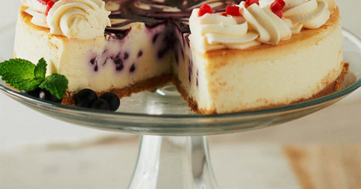 White Chocolate Blueberry Cheesecake by Junior's Cheesecake | Goldbelly